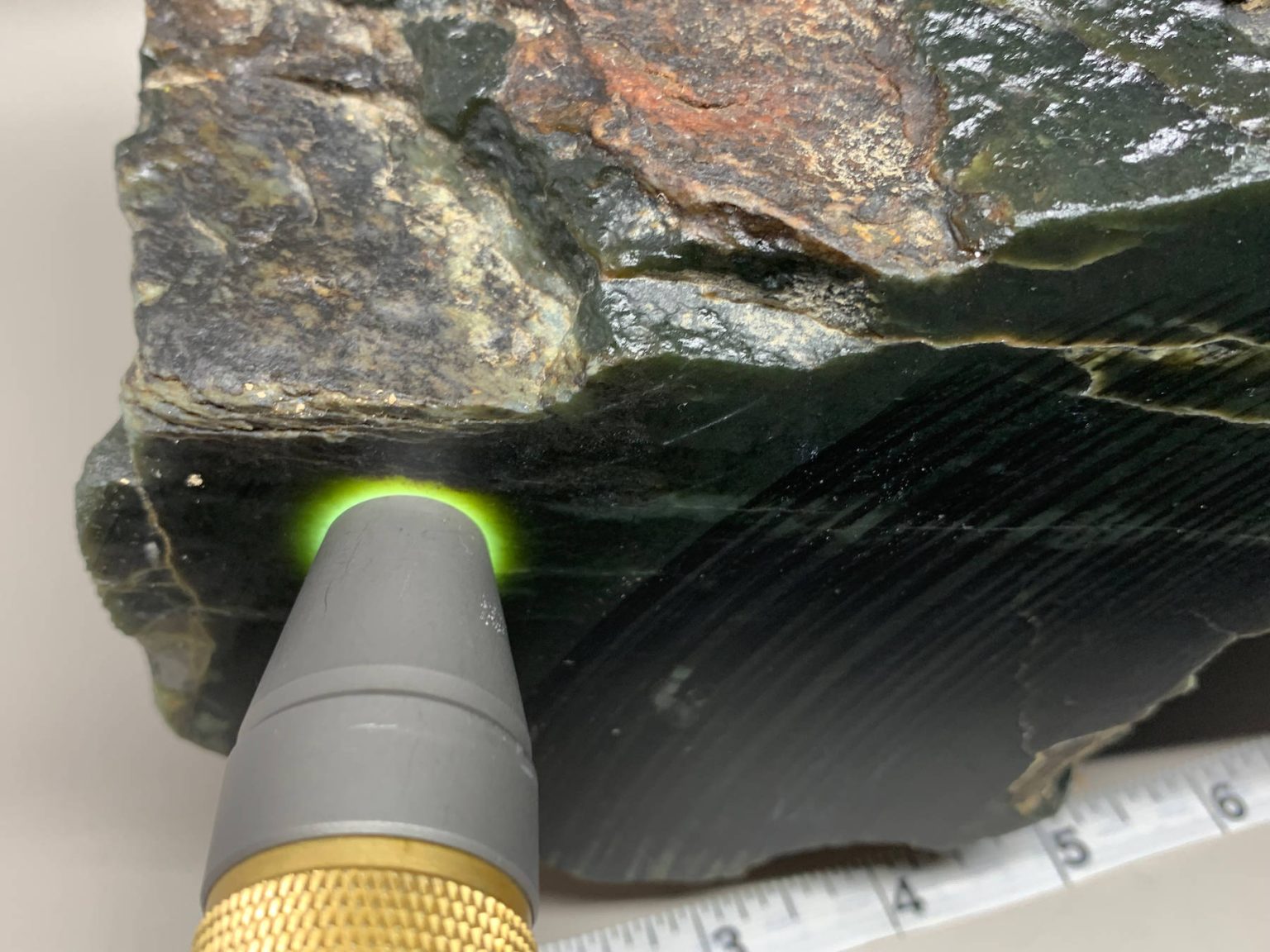 Dark Olive Nephrite w/quartz crystals Windslick cut bottom